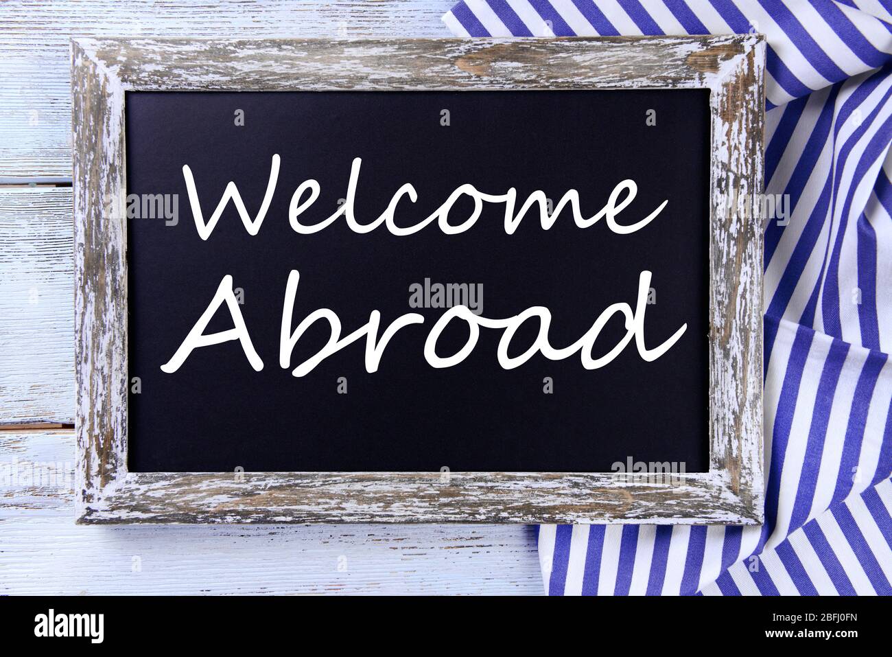 Welcome abroad written on chalkboard, close-up Stock Photo - Alamy