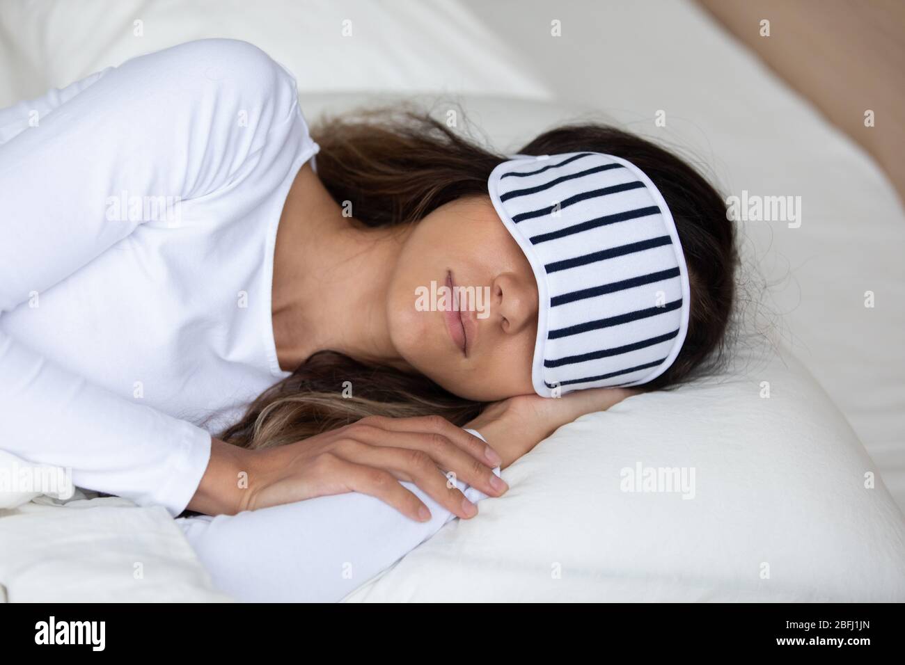 Woman bed eye mask hi-res stock photography and images - Alamy