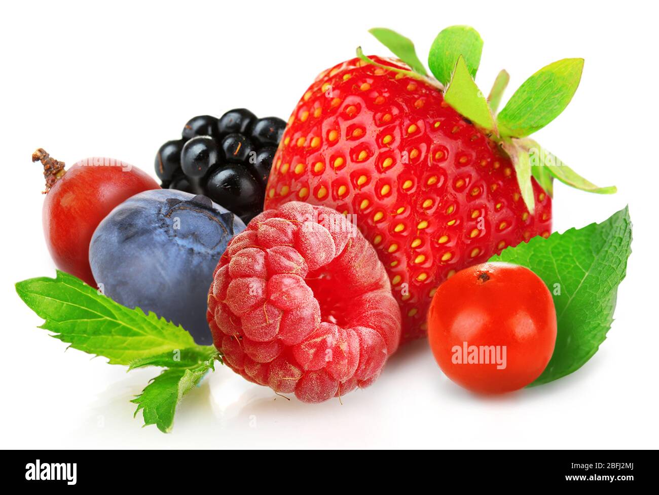 Berries mix with mint isolated on white Stock Photo - Alamy