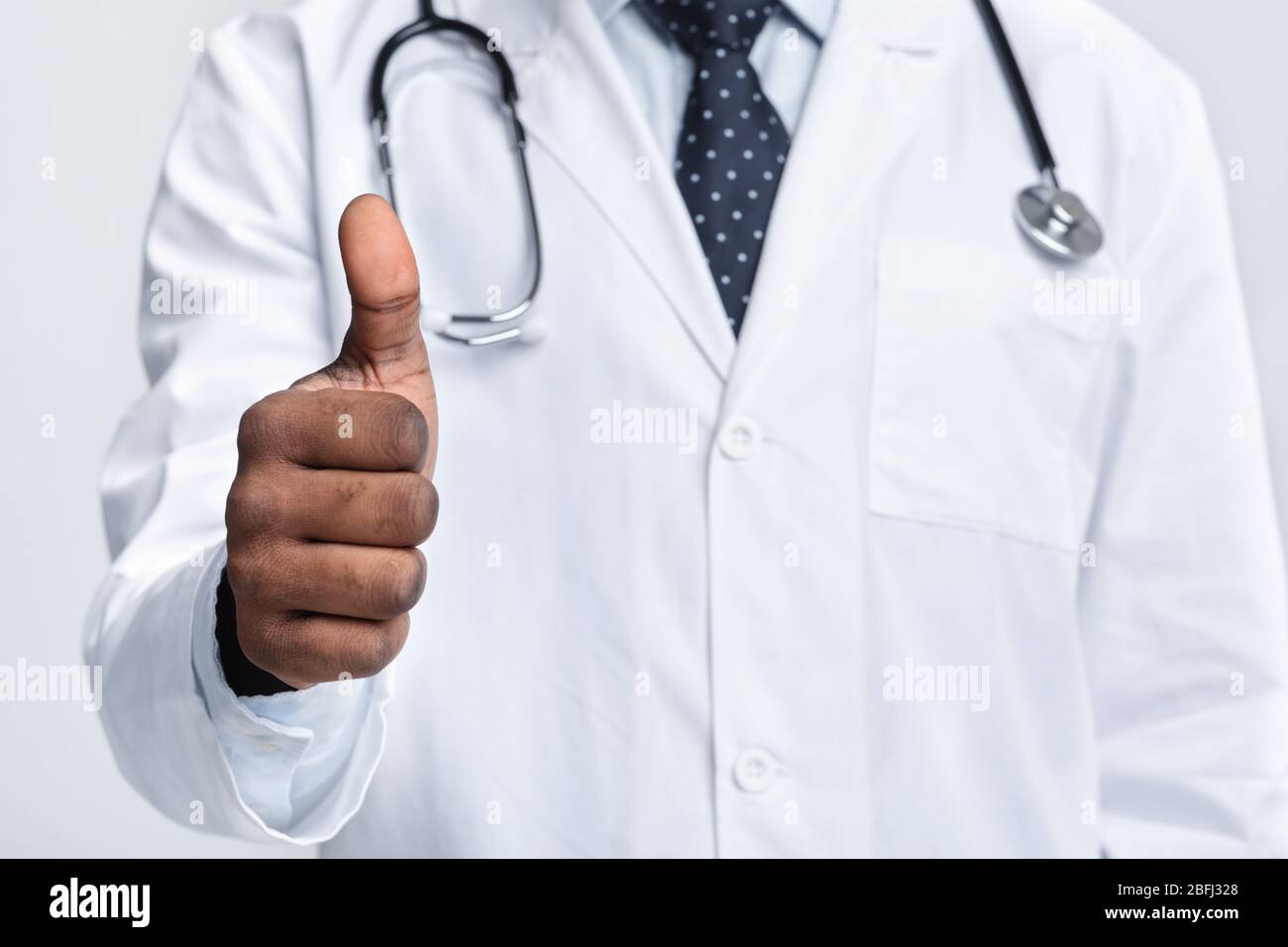 African american doctor thumbs up hi-res stock photography and images ...