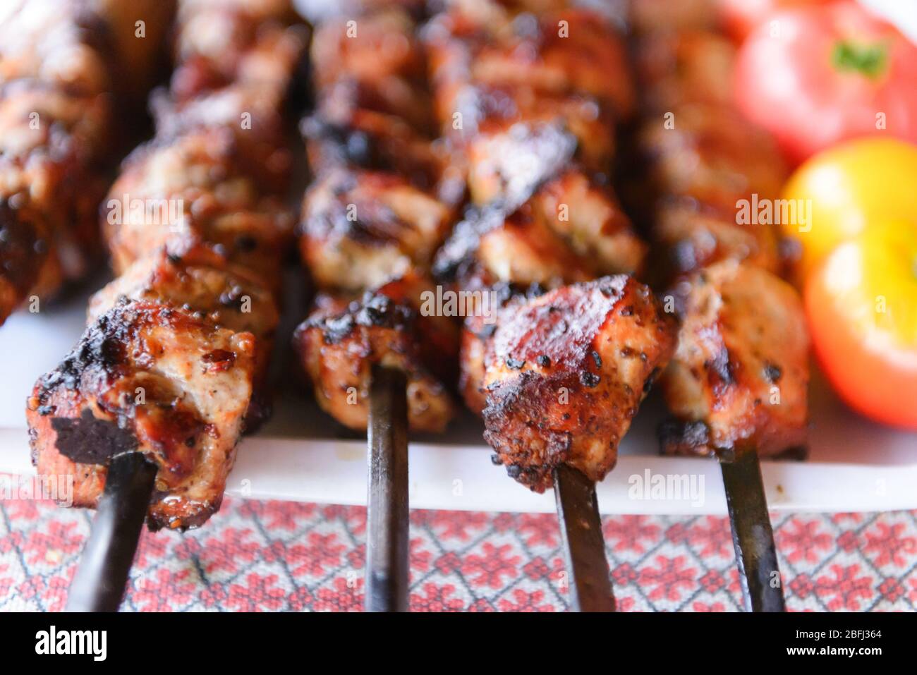 Ready kebab on the table. Grilled meat. Lunch cooked on coals Stock ...
