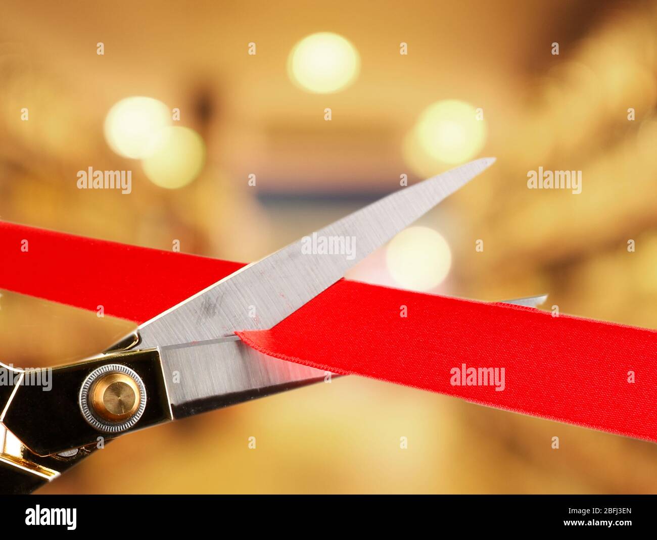 Grand opening, cutting red ribbon Stock Photo - Alamy