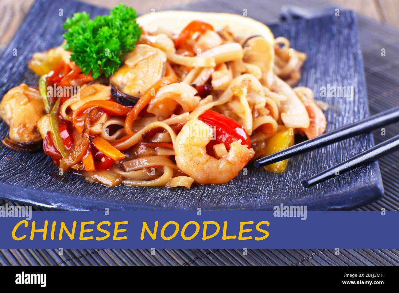 Chinese noodles on plate and space for your text Stock Photo - Alamy