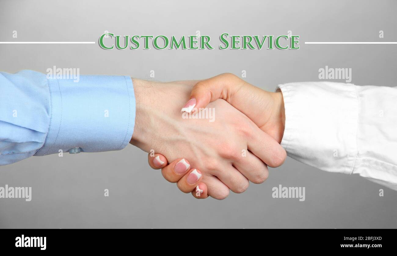 Business handshake symbolizing support and customer service concept ...