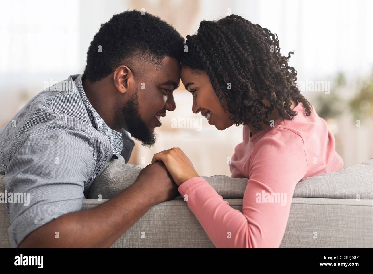 Two people foreheads touching hi-res stock photography and images - Alamy