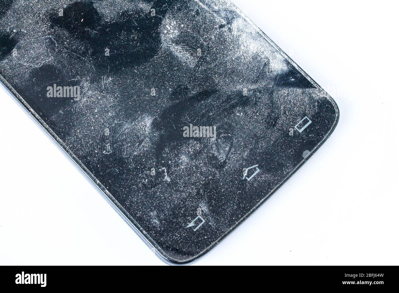 Old broken mobile phone on a white background Stock Photo - Alamy