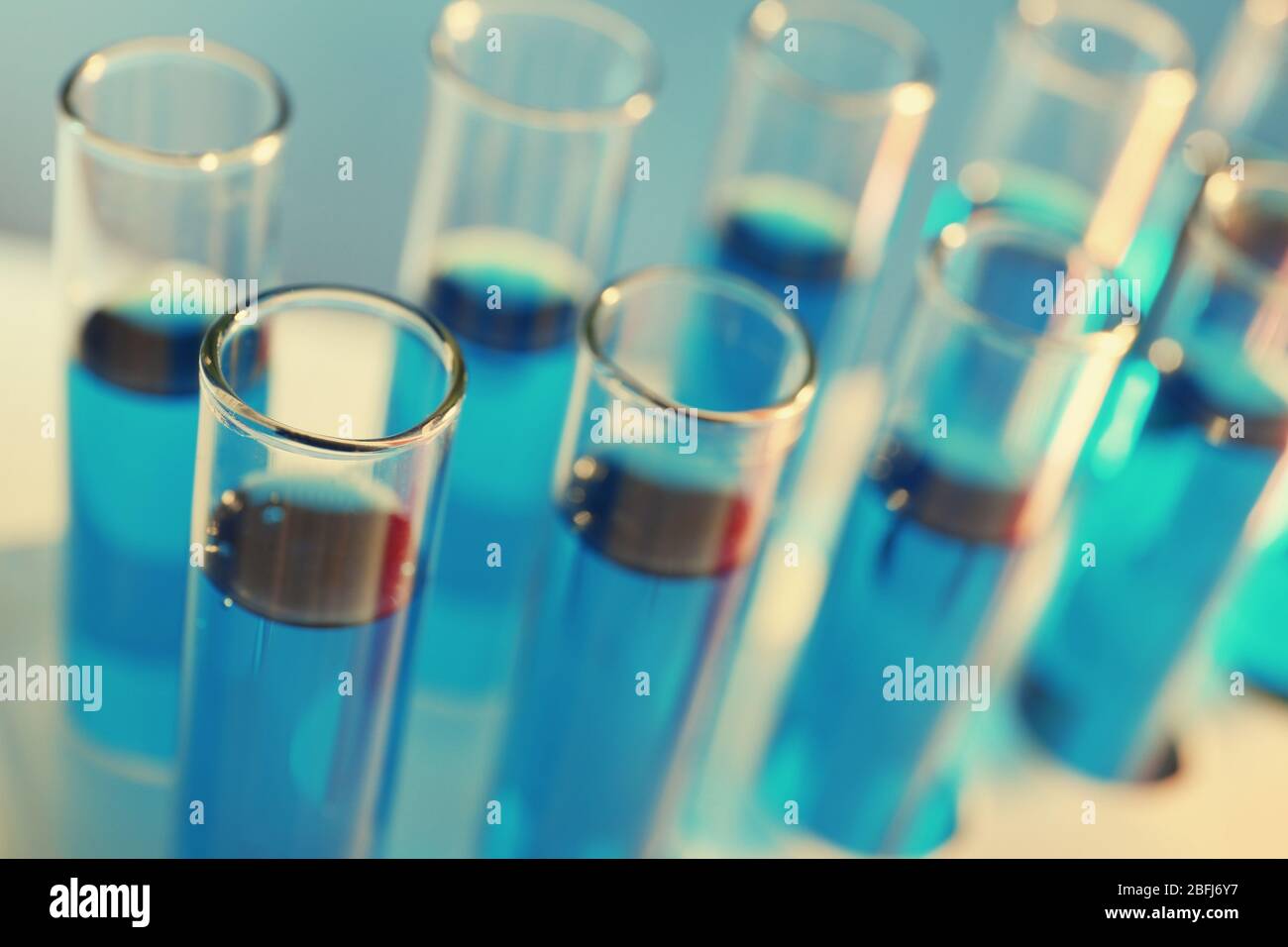 Test-tubes with color fluid, close-up Stock Photo - Alamy