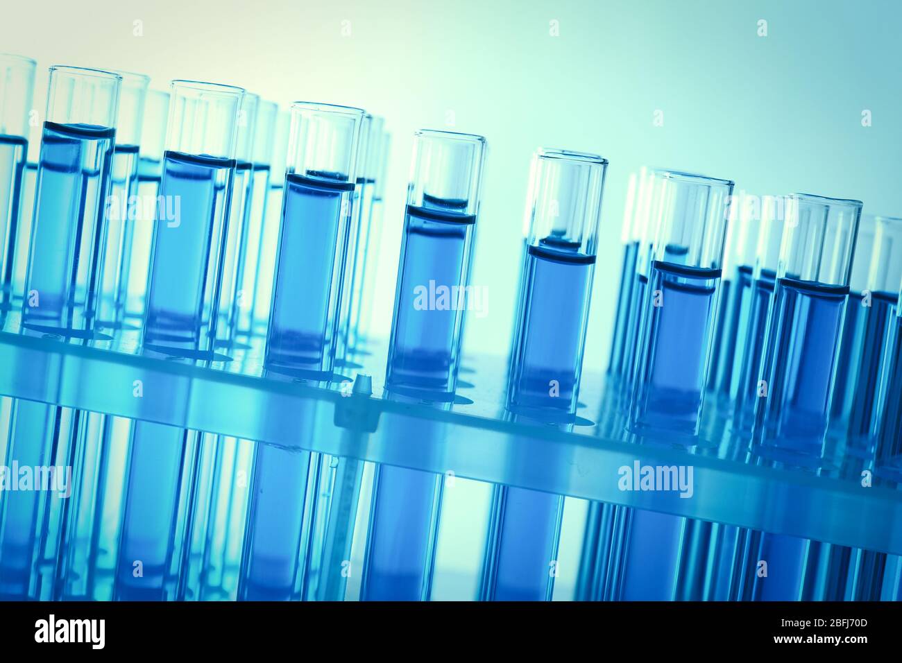 Test-tubes with blue fluid, close-up Stock Photo - Alamy