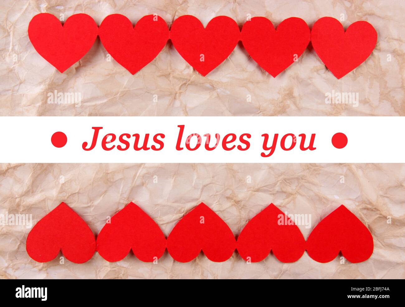 Jesus loves you text in frame on craft paper background Stock Photo - Alamy