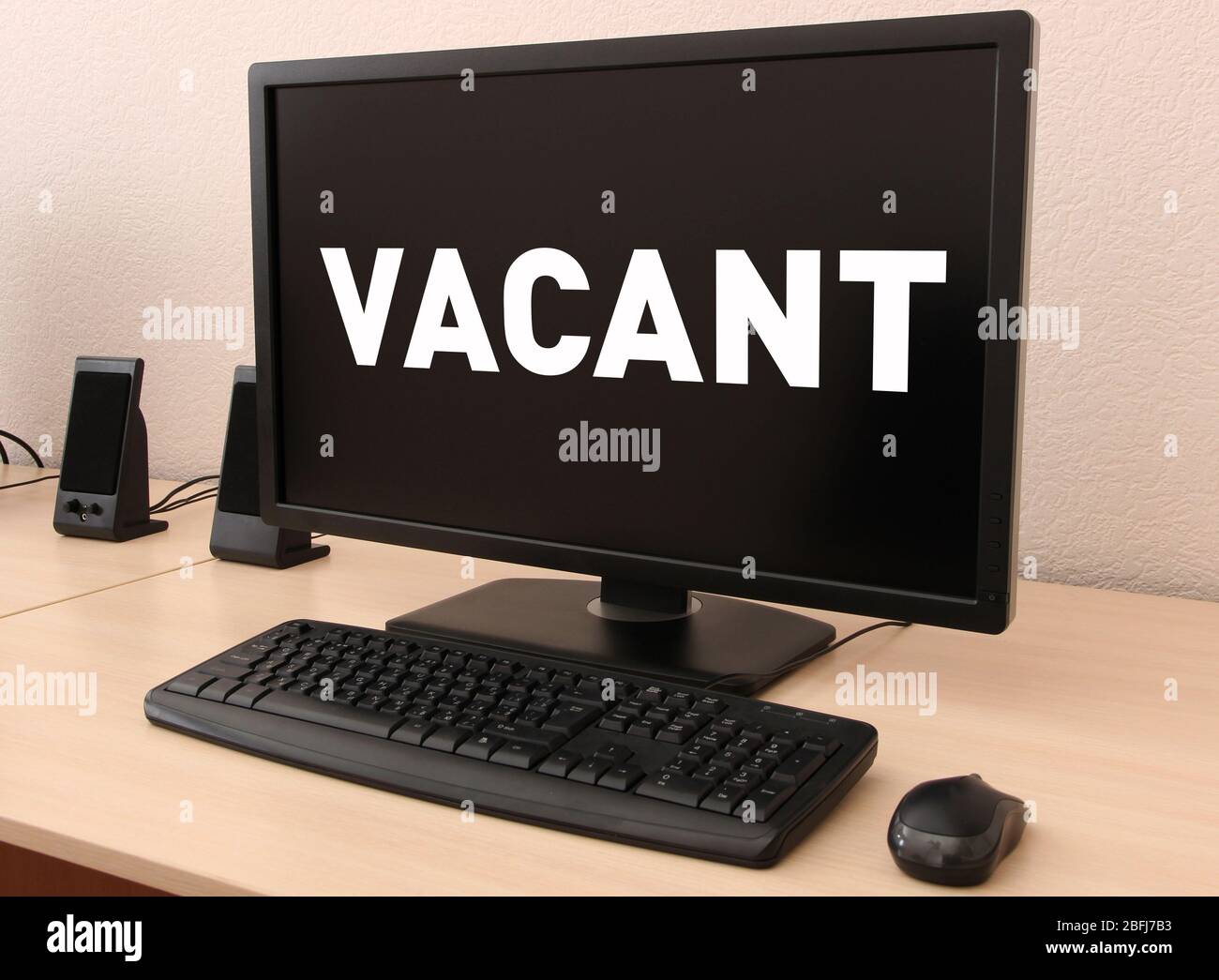 Office workplace with vacant sign Stock Photo - Alamy