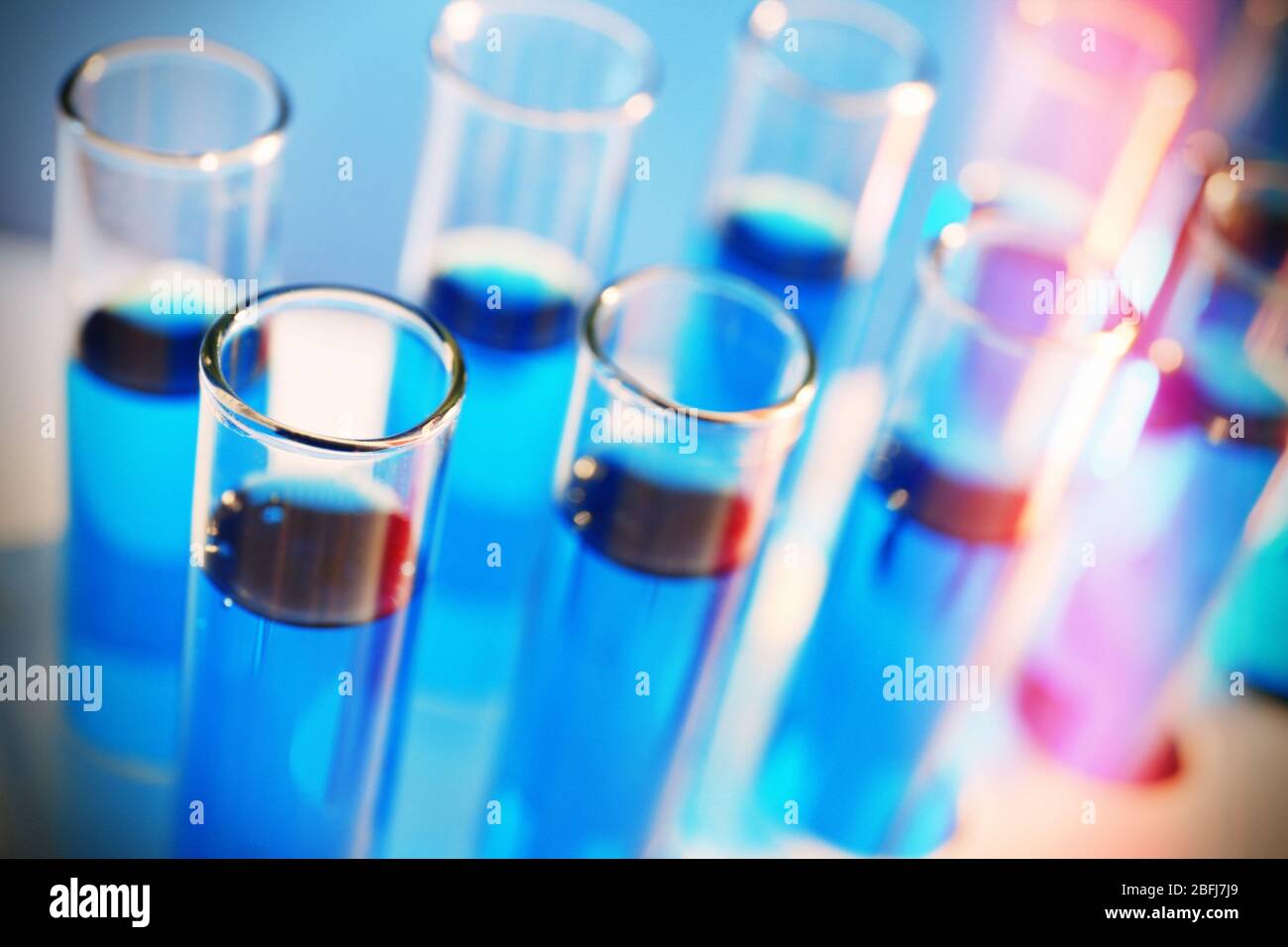 Test-tubes with color fluid, close-up Stock Photo - Alamy