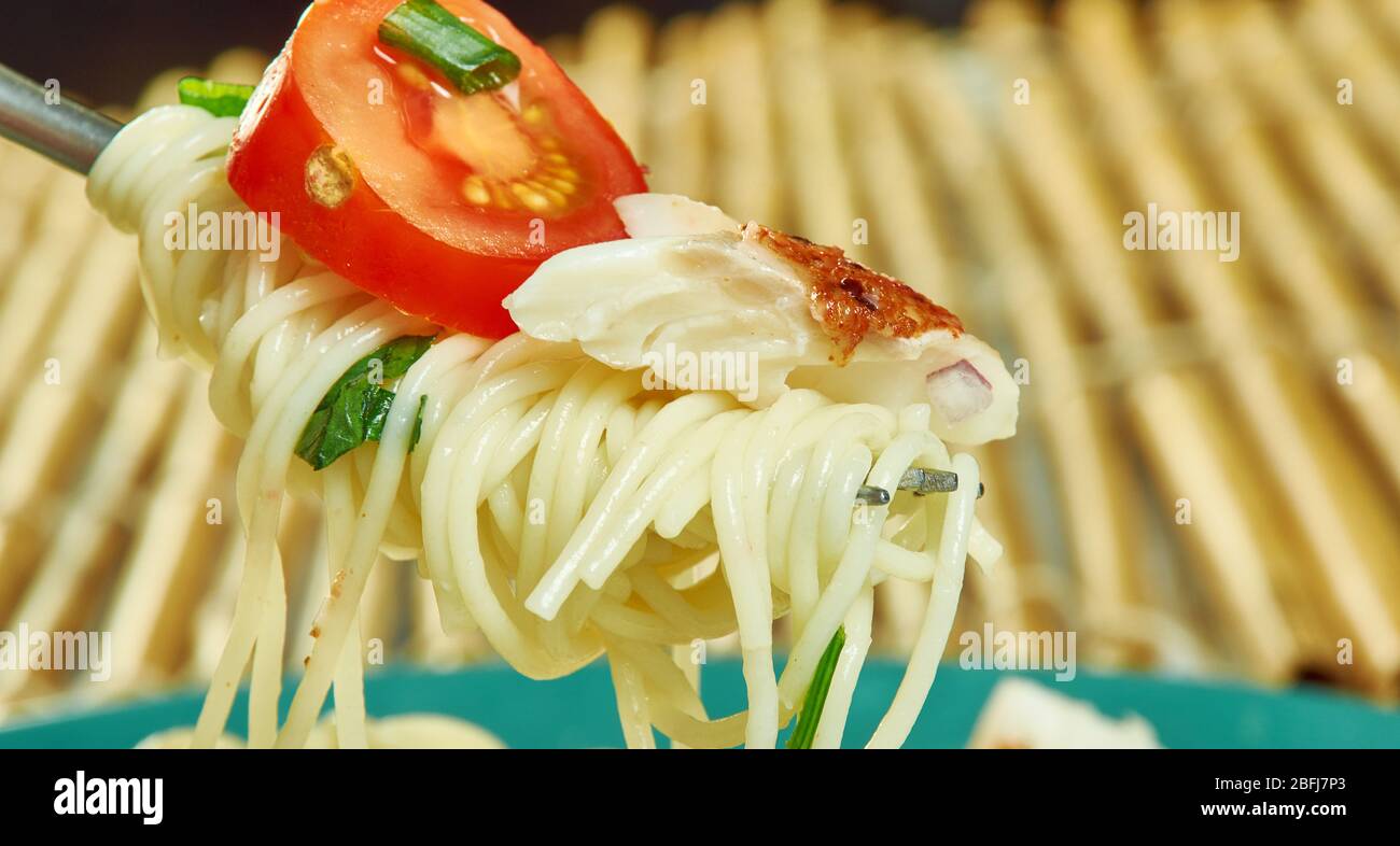 Cod puttanesca with spaghetti, combined spaghetti with white fish and ...