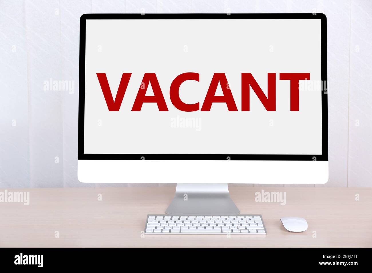 Office workplace with vacant sign Stock Photo - Alamy
