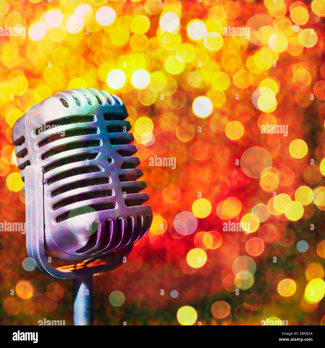 Retro microphone on bright background, Karaoke concept Stock Photo - Alamy