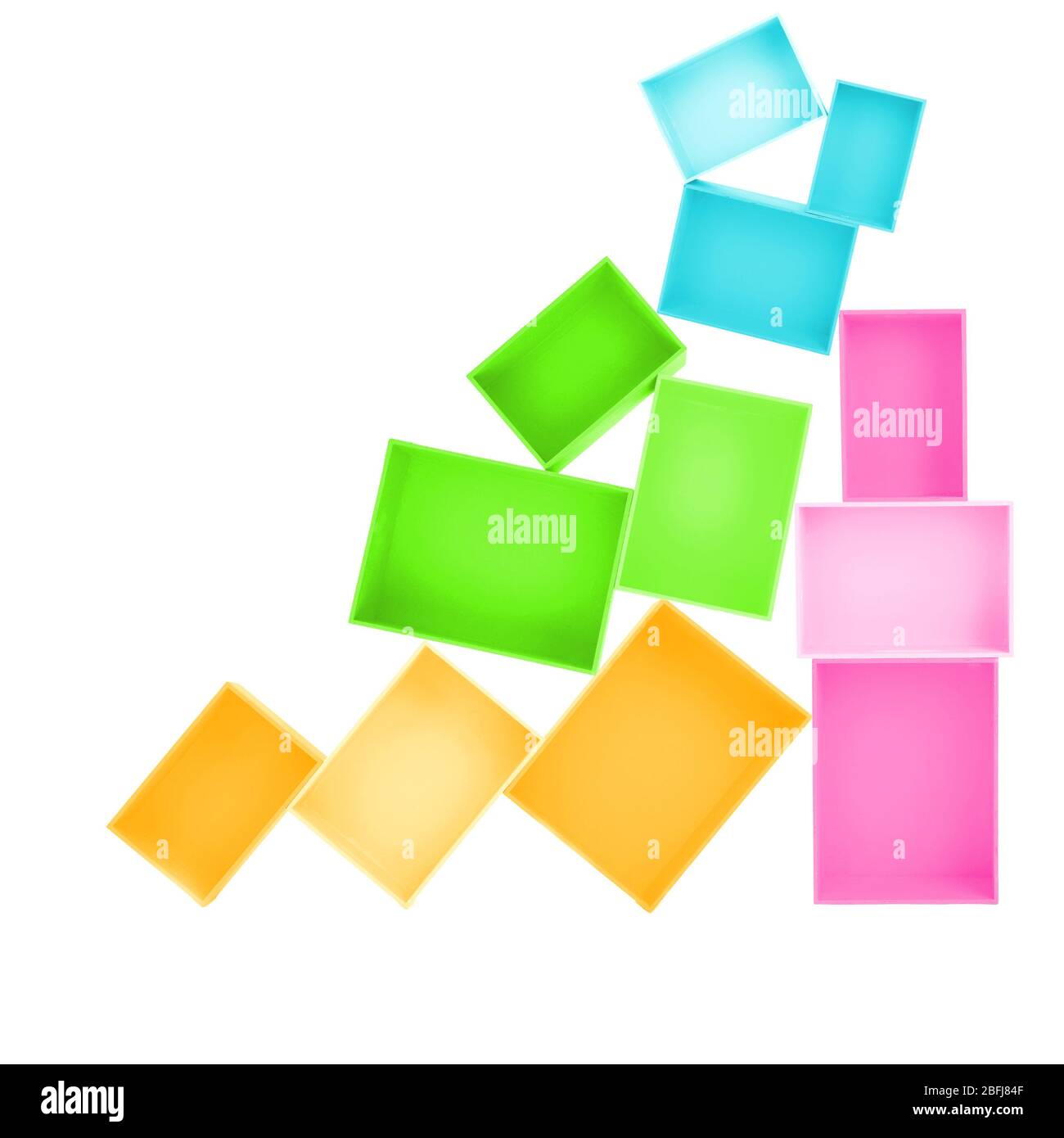 Multicoloured wooden boxes isolated on white Stock Photo - Alamy