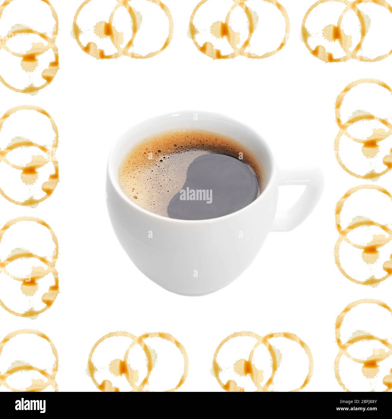 Cup of coffee in coffee stains frame isolated on white Stock Photo - Alamy