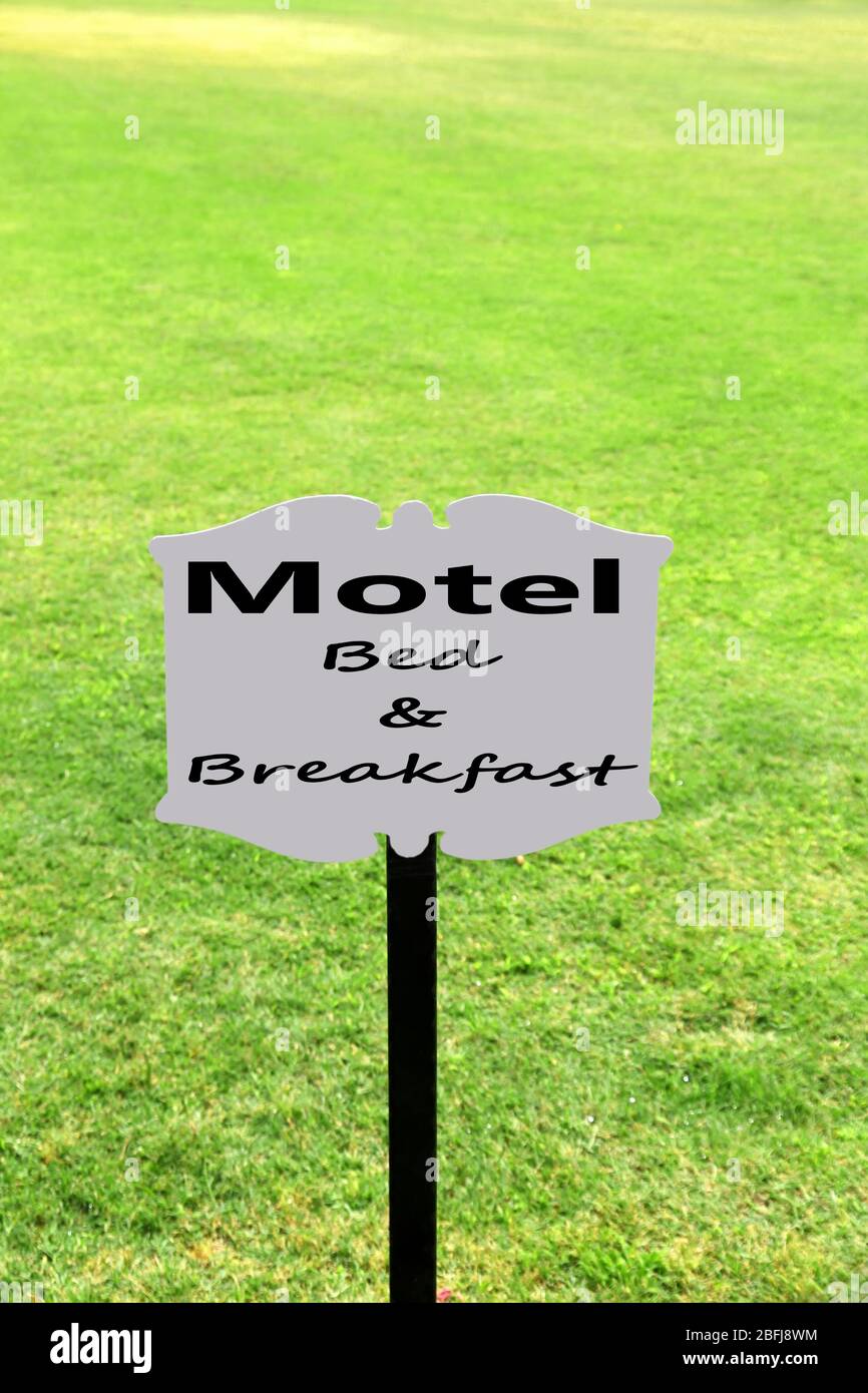 Signboard with text Motel, Bed and Breakfast Stock Photo - Alamy