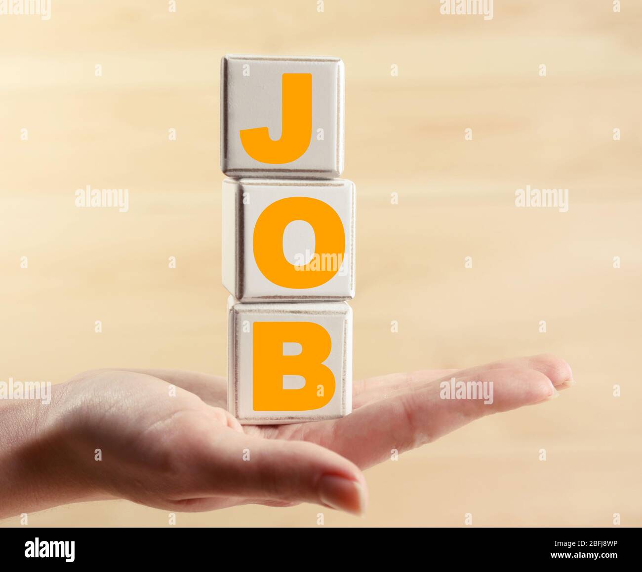 Job word spelled with wooden cubes Stock Photo - Alamy