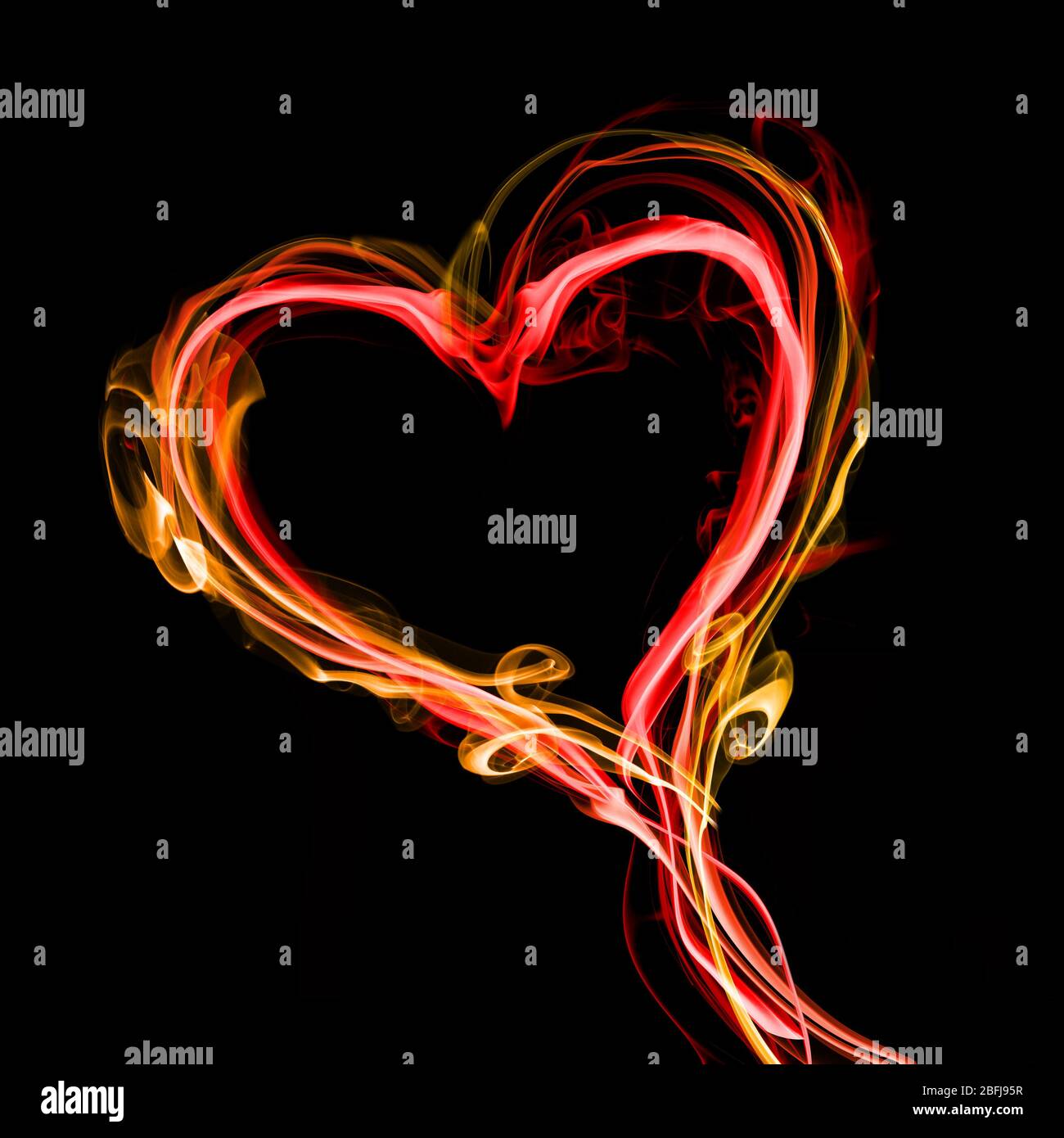 Abstract smoke in shape of heart isolated on black Stock Photo - Alamy