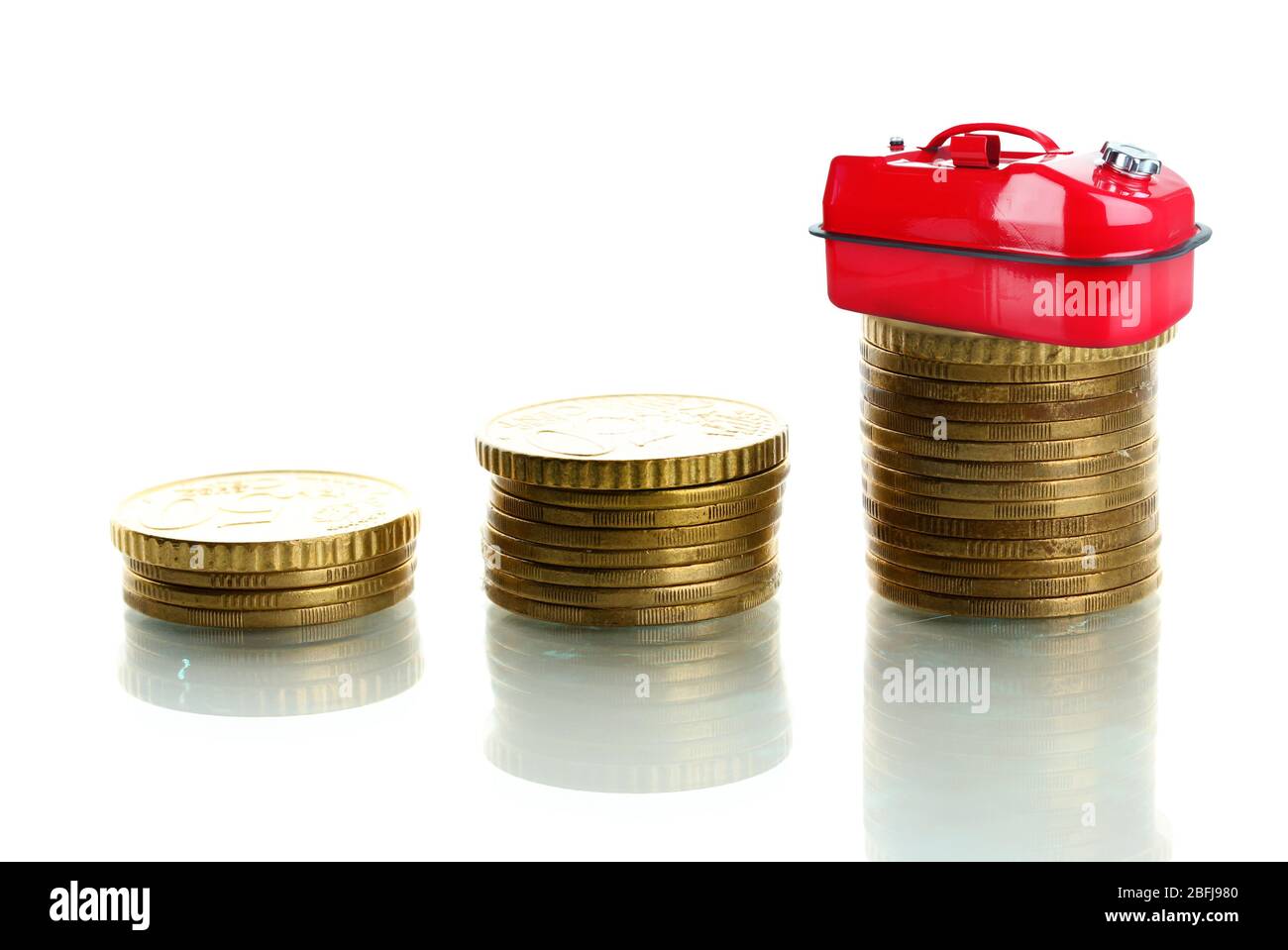 Fuel canister on stack of coins isolated on white Stock Photo - Alamy