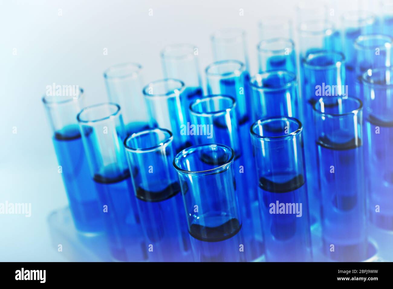 Test-tubes with blue fluid, close-up Stock Photo - Alamy