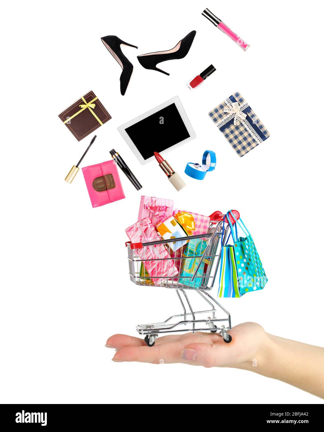 Goods falling into cart isolated on white Stock Photo - Alamy