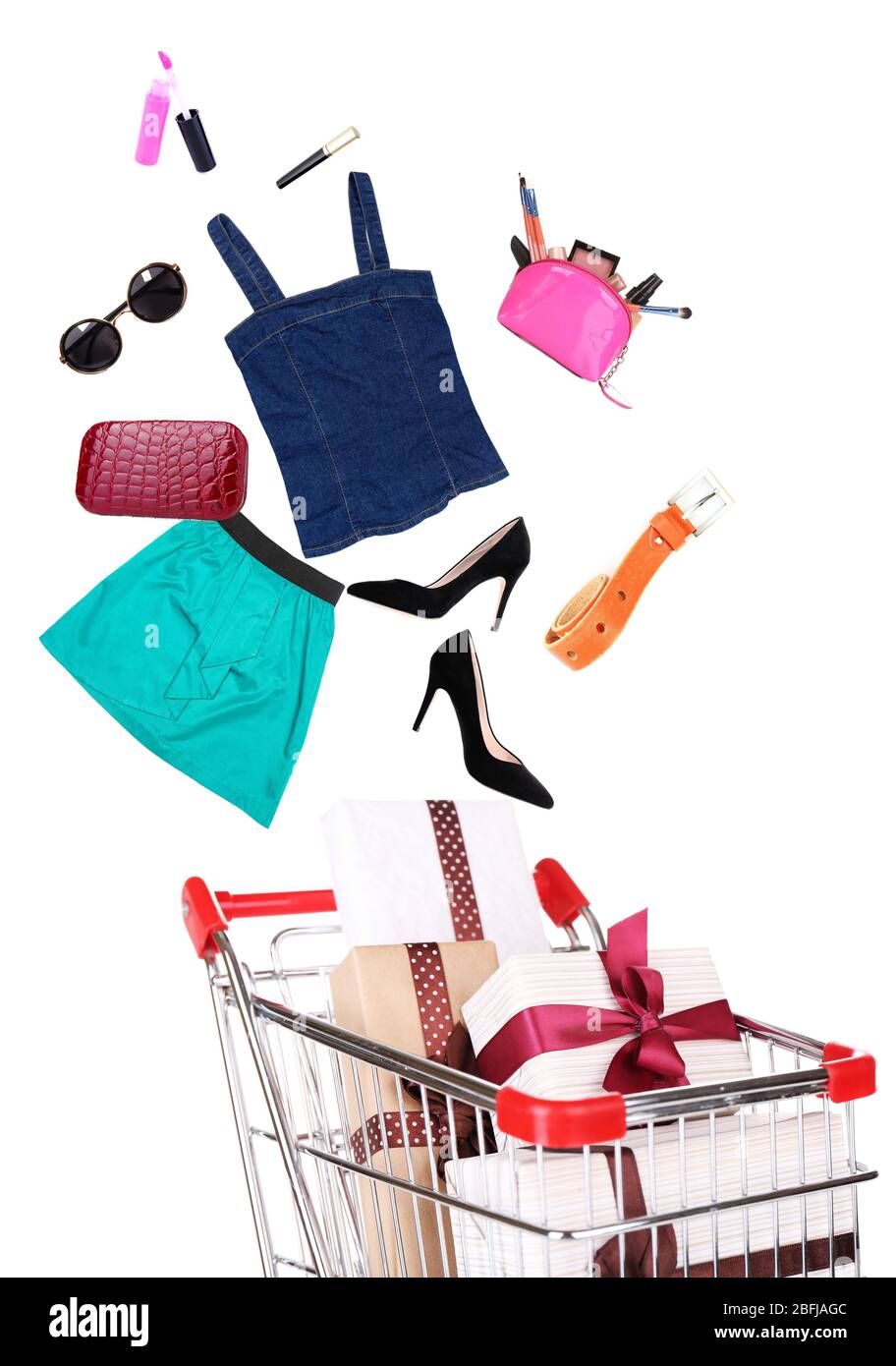 Goods falling into cart isolated on white Stock Photo - Alamy