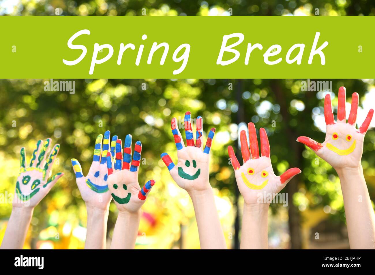 Spring break concept. Smiling colorful hands on nature background Stock ...