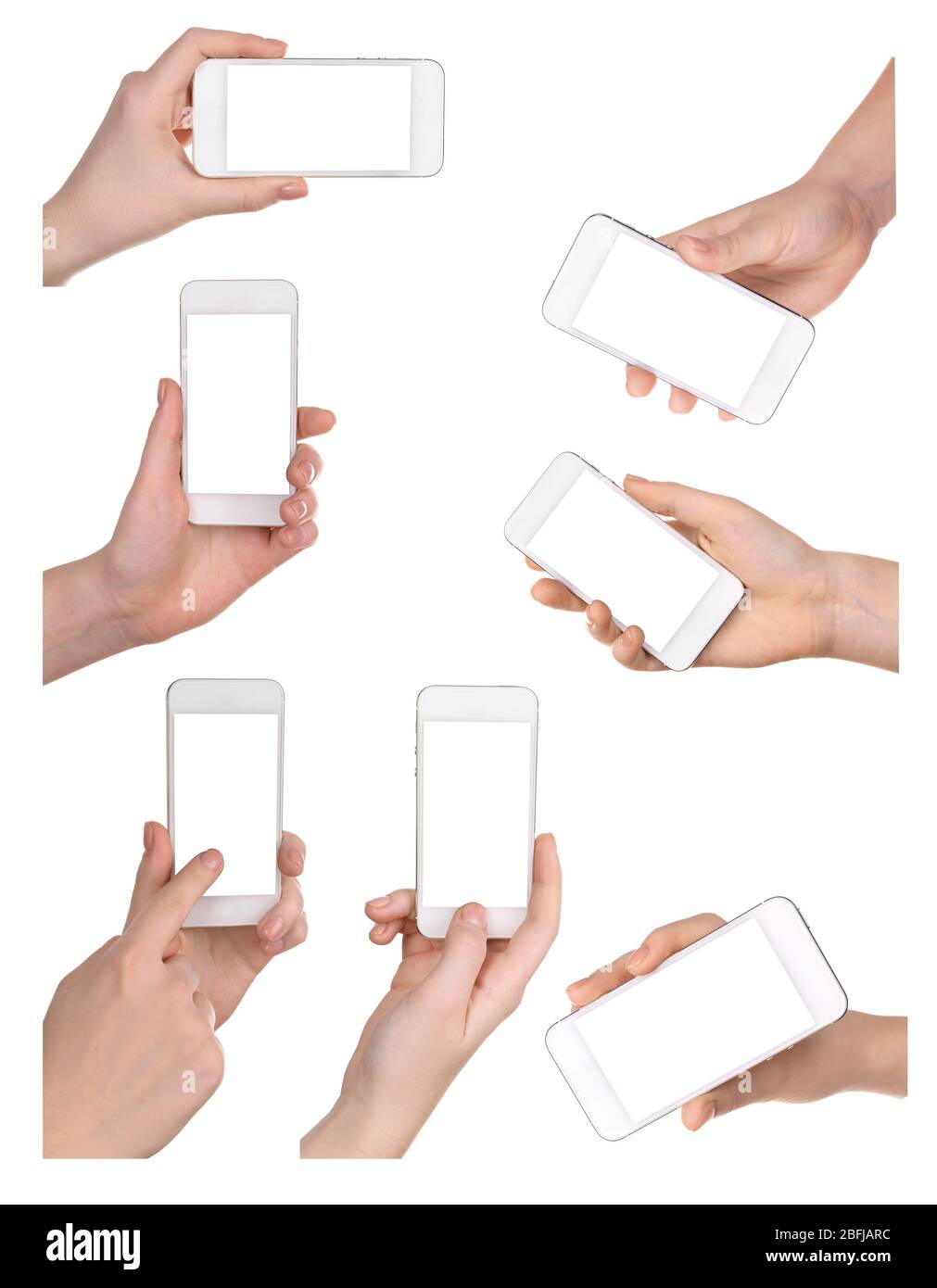 Hands holding smart phones isolated on white Stock Photo - Alamy