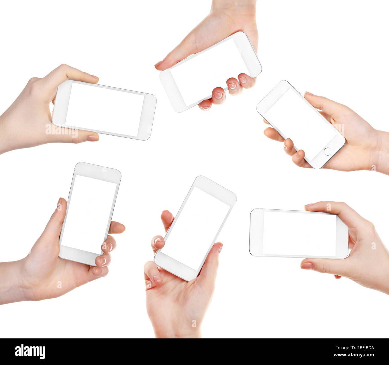 Many hand holding mobile phones hi-res stock photography and images - Alamy