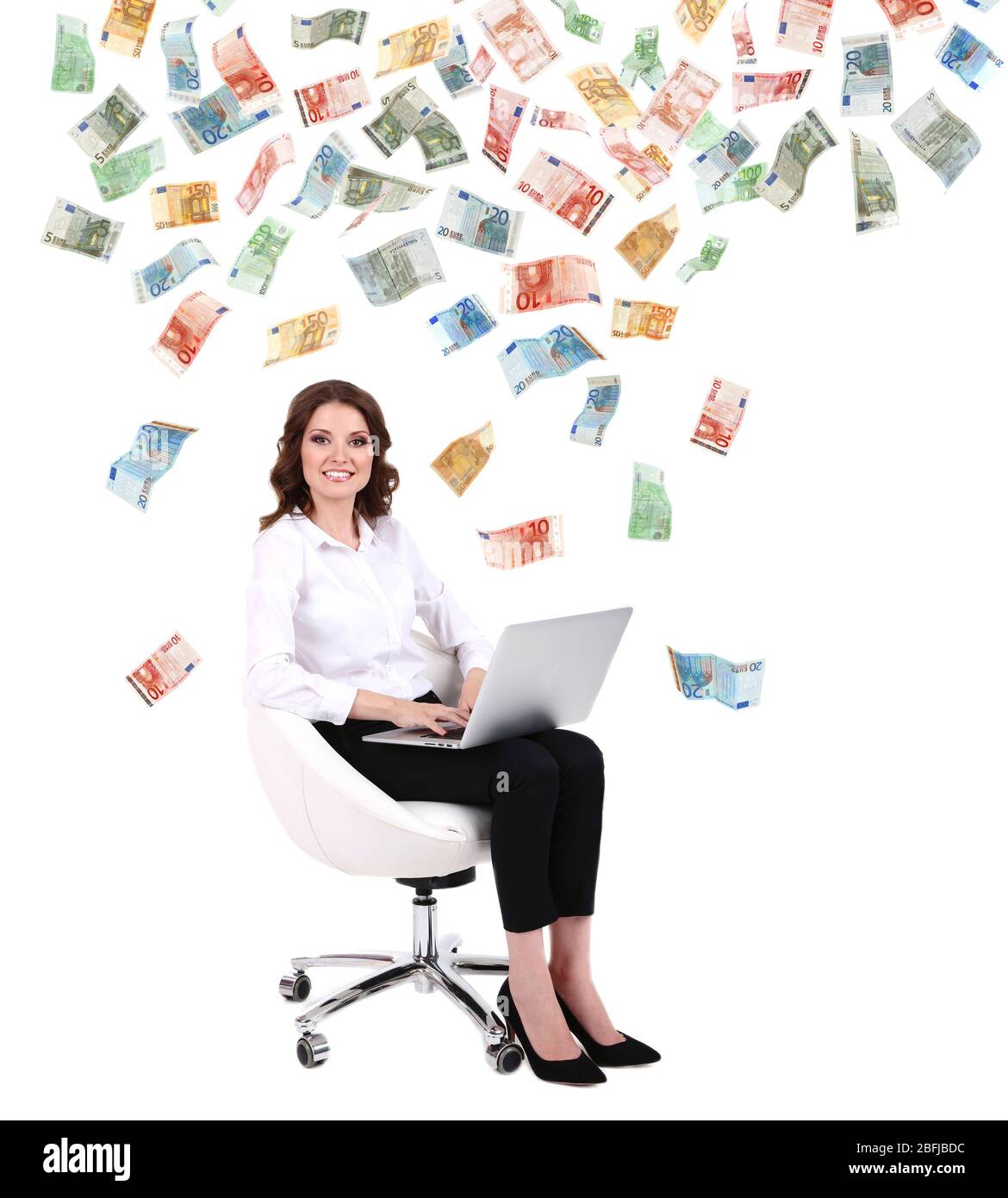 Successful businesswoman with pile of money Stock Photo - Alamy