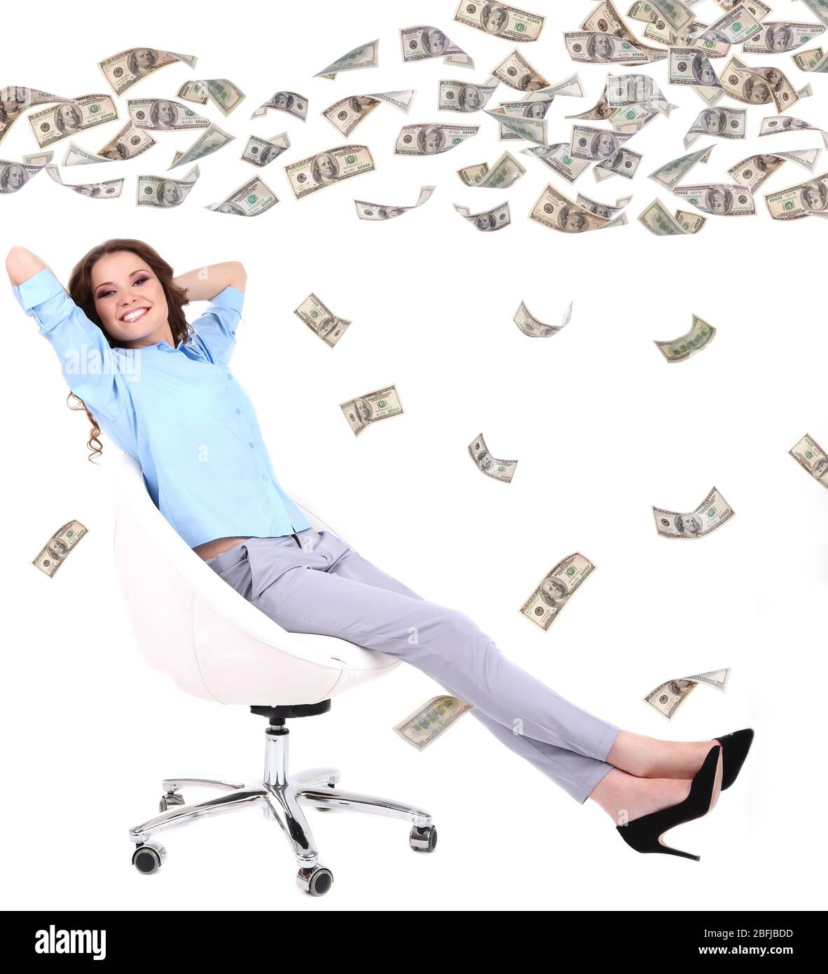 Successful businesswoman with pile of money Stock Photo - Alamy