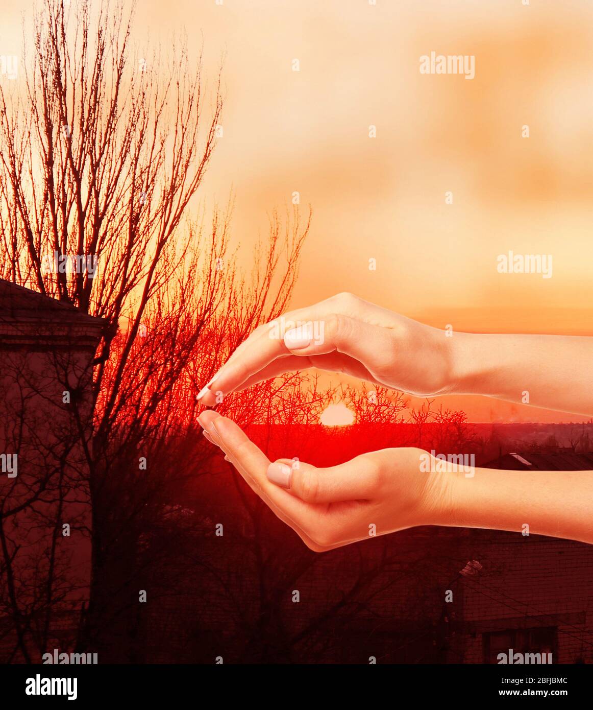 Holding sun in hands hi-res stock photography and images - Alamy