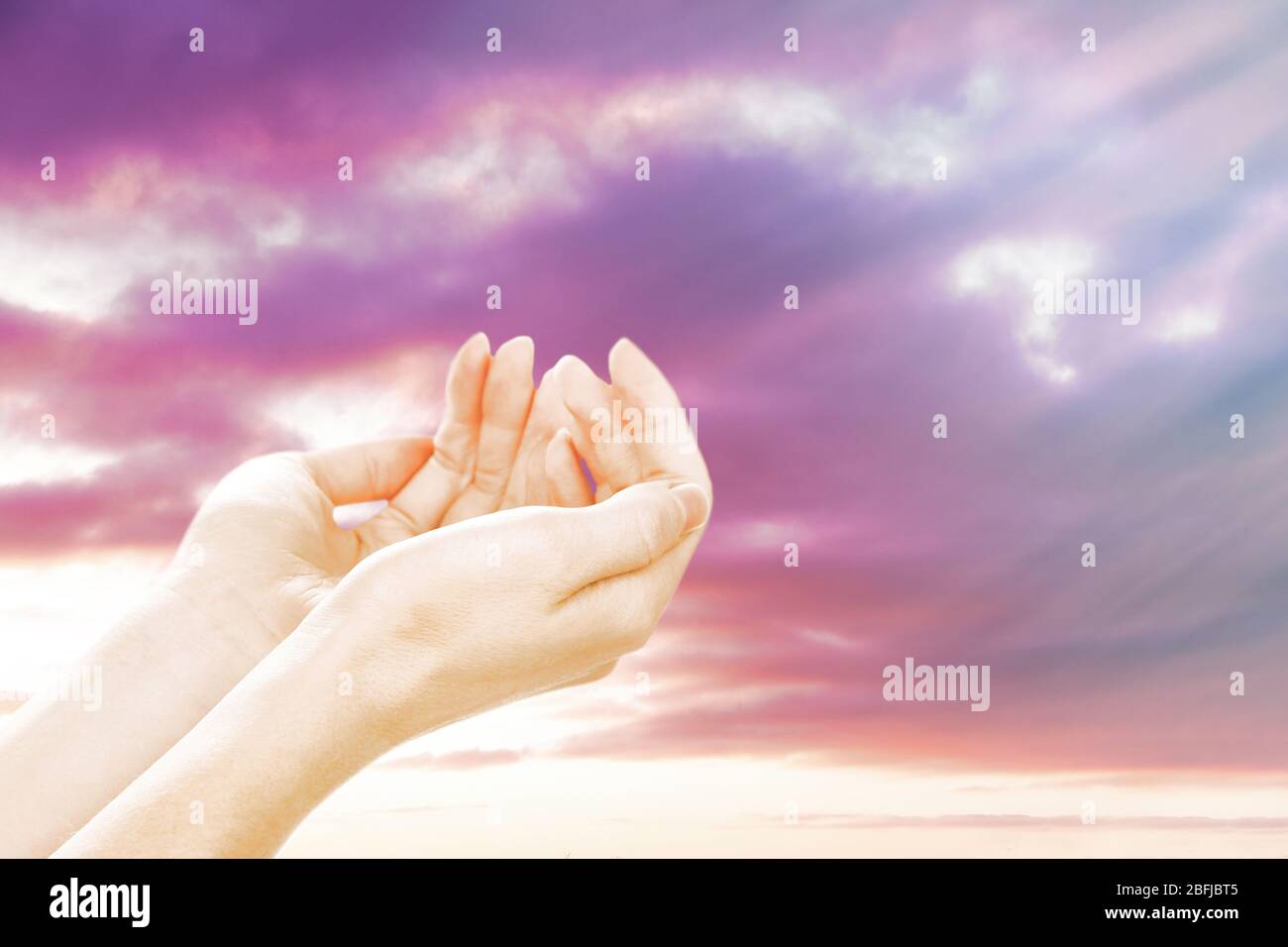 Sunset landscape glowing power symbol hi-res stock photography and ...