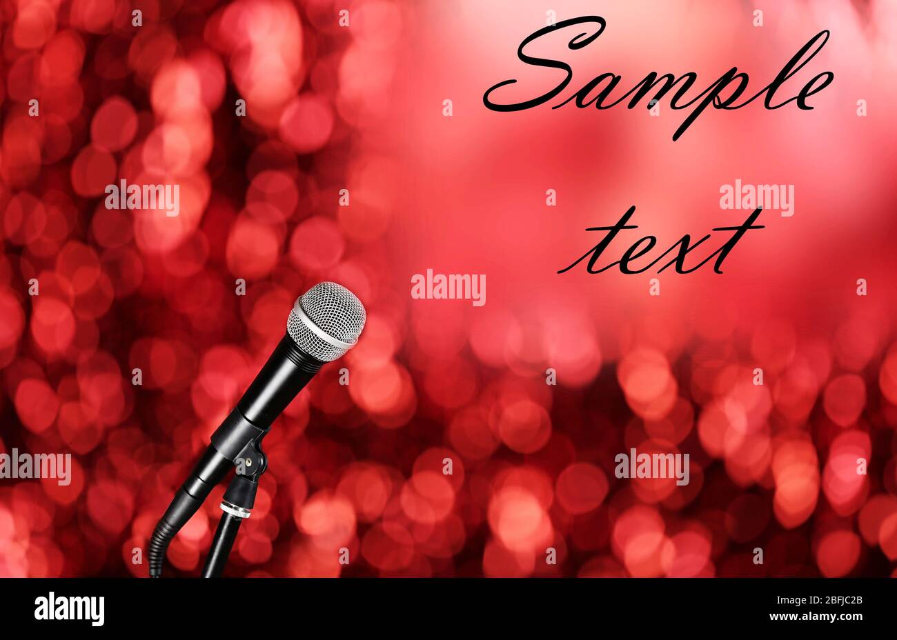 Microphone on bright red background Stock Photo - Alamy