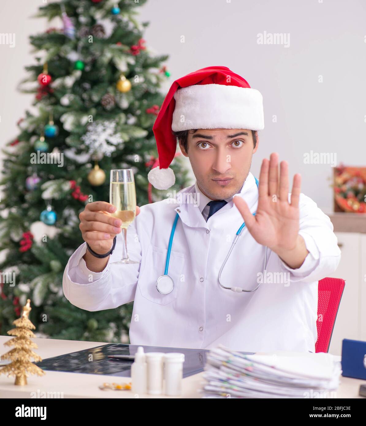 The doctor on the shift on christmas eve Stock Photo - Alamy