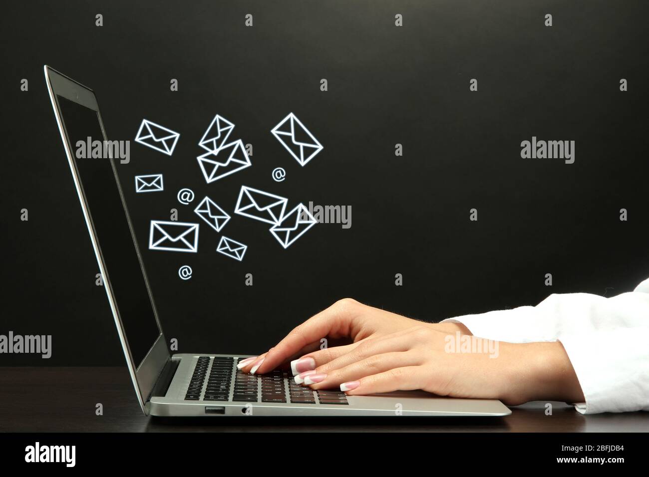 Businesswoman checking email Stock Photo - Alamy