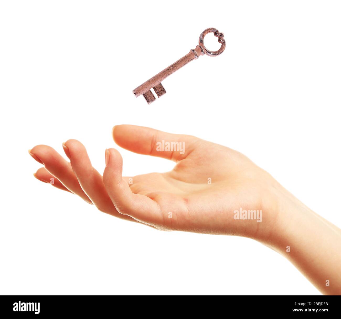 Female hand with key isolated on white Stock Photo - Alamy