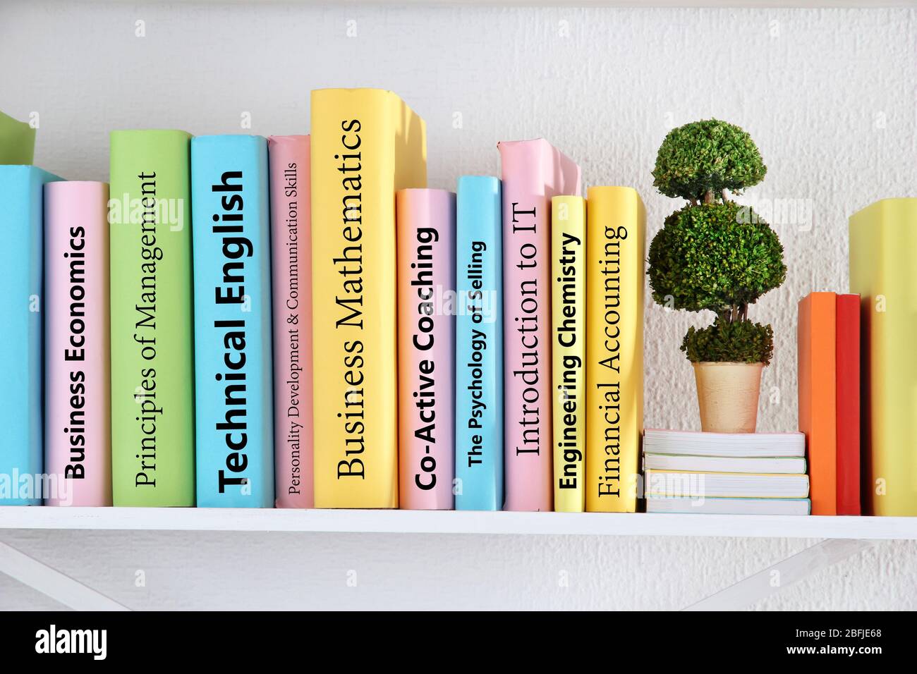 Textbooks on shelf close-up Stock Photo - Alamy