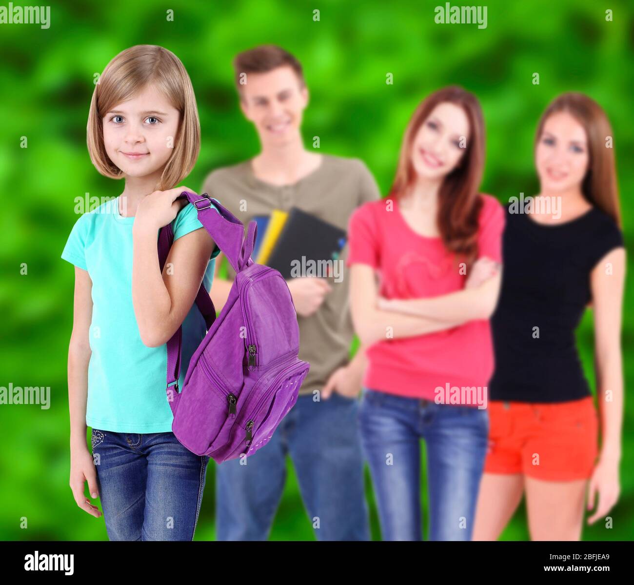 School students on nature background Stock Photo - Alamy