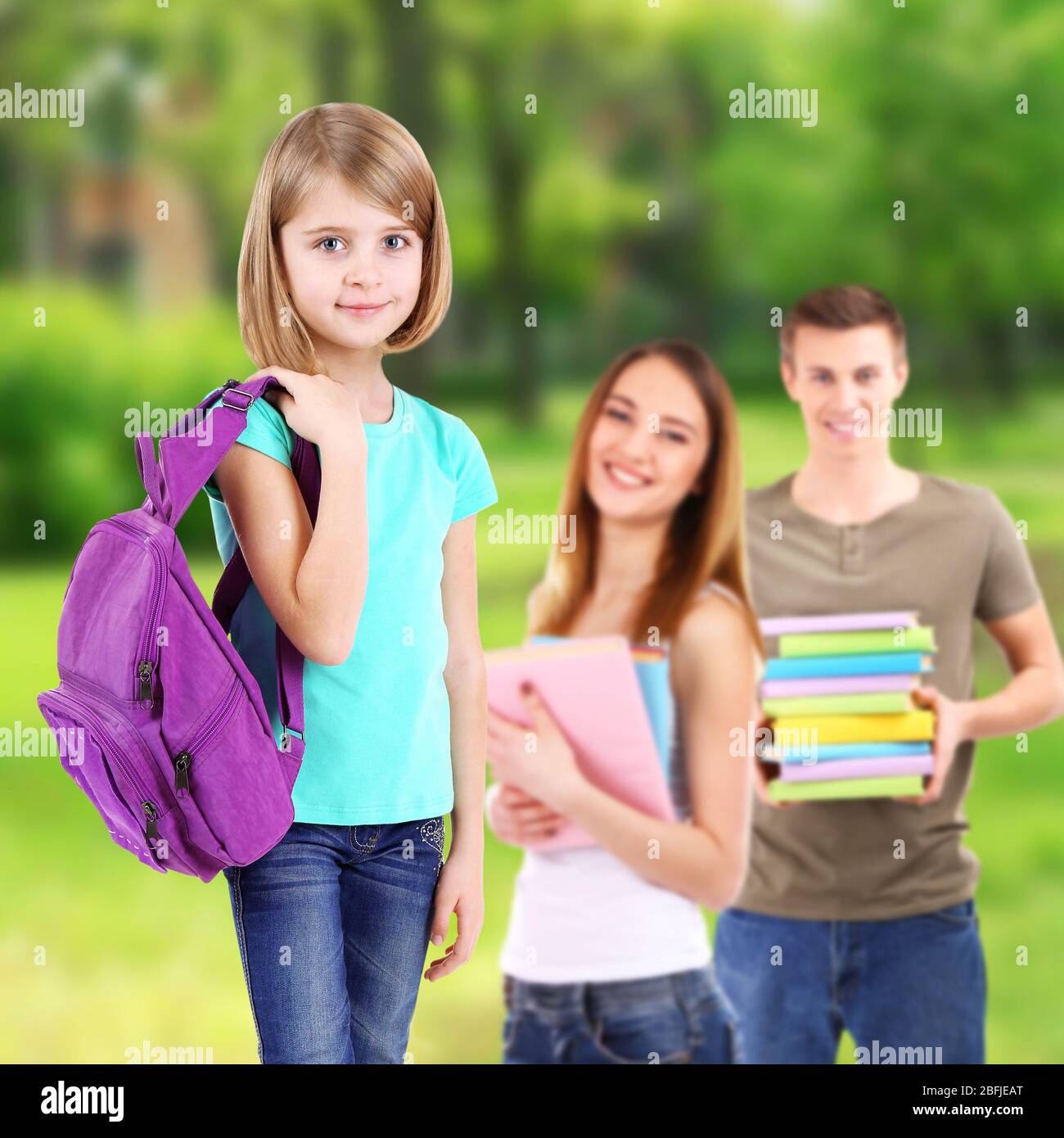 School students on nature background Stock Photo - Alamy