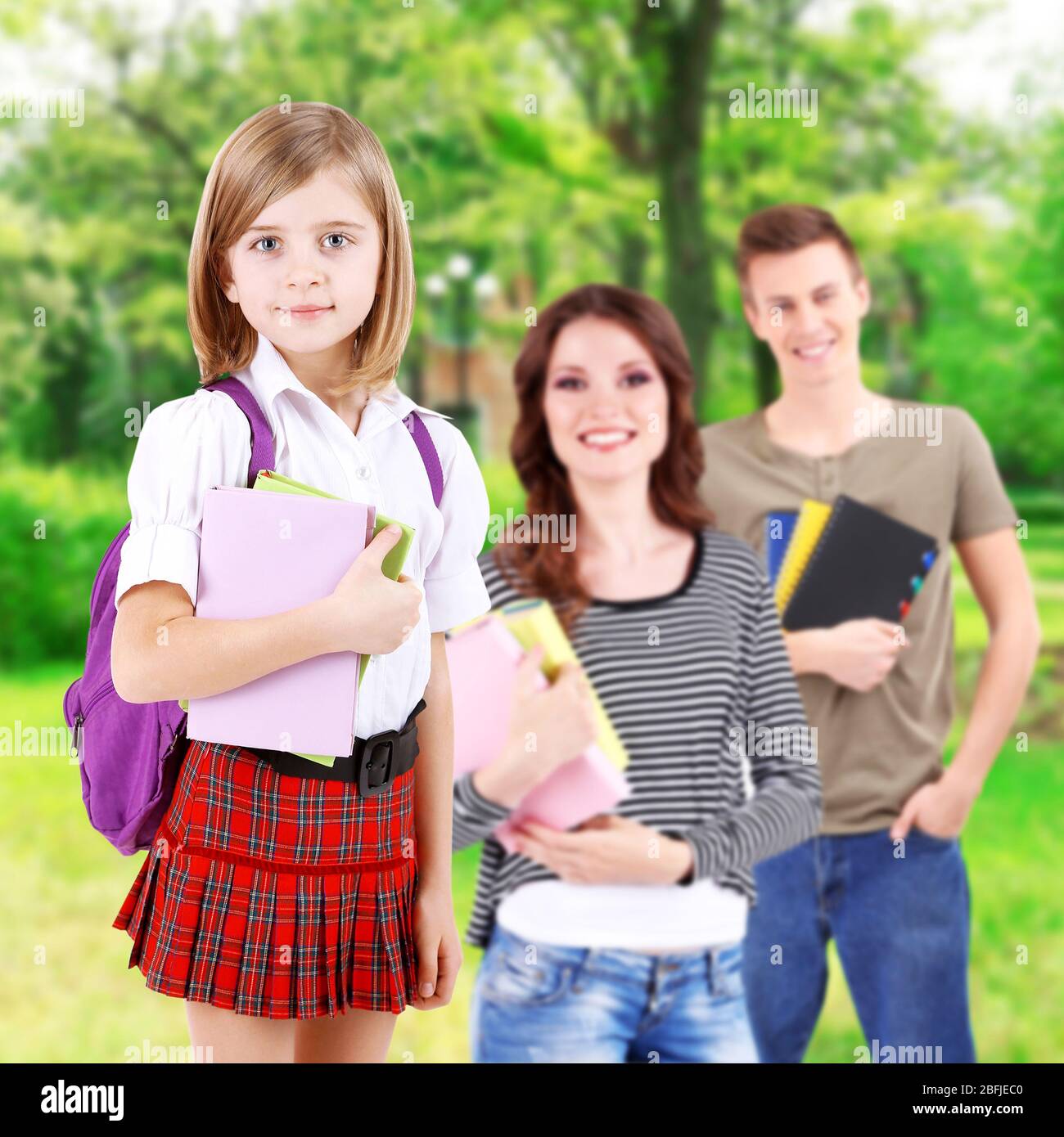 School students on nature background Stock Photo - Alamy