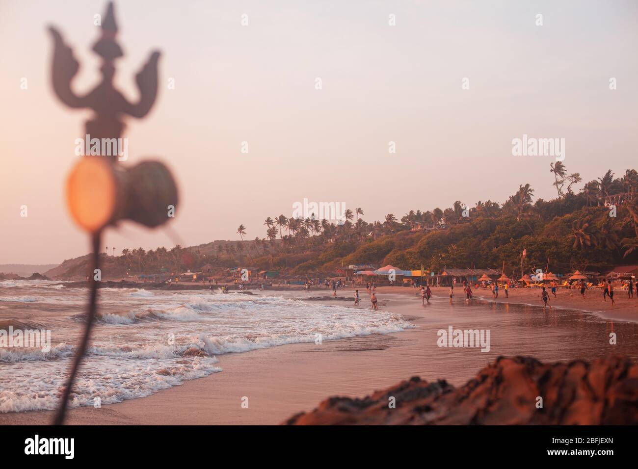 Trident totem near Shiva Face Rock Carving on Vagator Beach, Goa, India ...