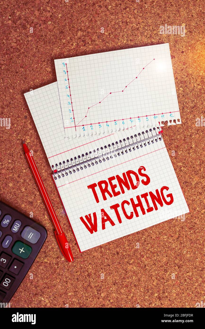 Writing note showing Trends Watching. Business concept for change or ...