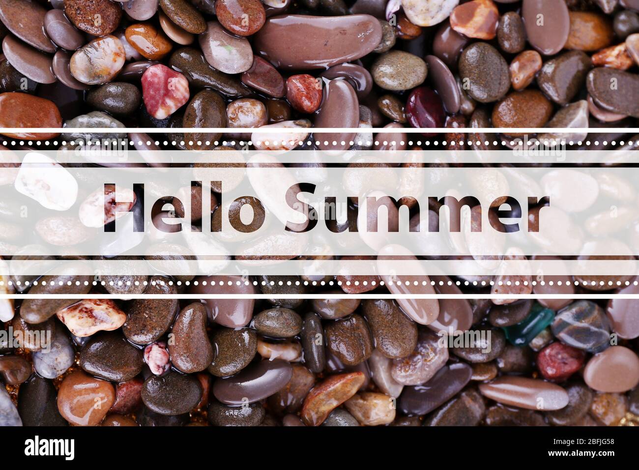 Hello summer concept. Sea stones as background Stock Photo - Alamy