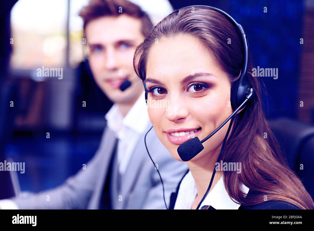 Call center operators at work Stock Photo - Alamy