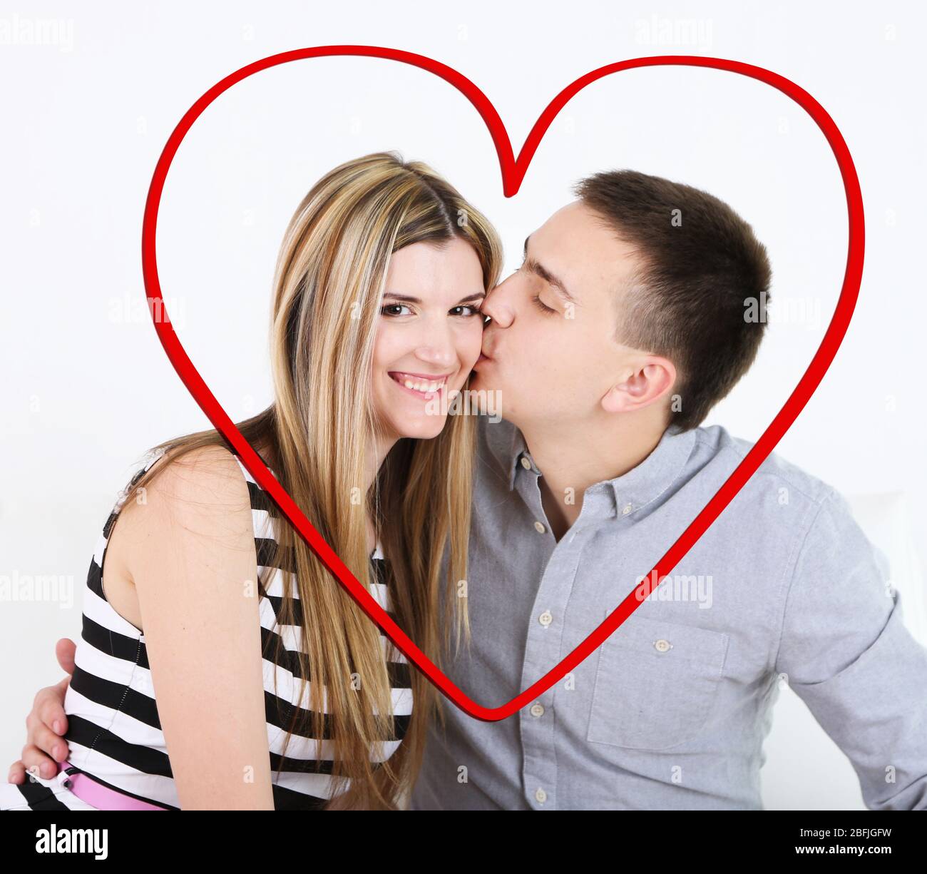 Happy family with drawing of heart Stock Photo - Alamy
