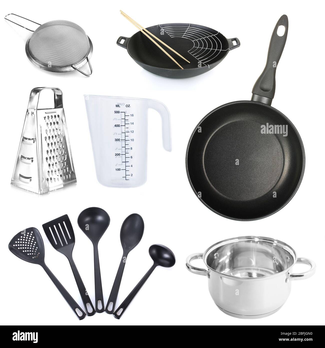 Kitchen utensils isolated on white Stock Photo - Alamy