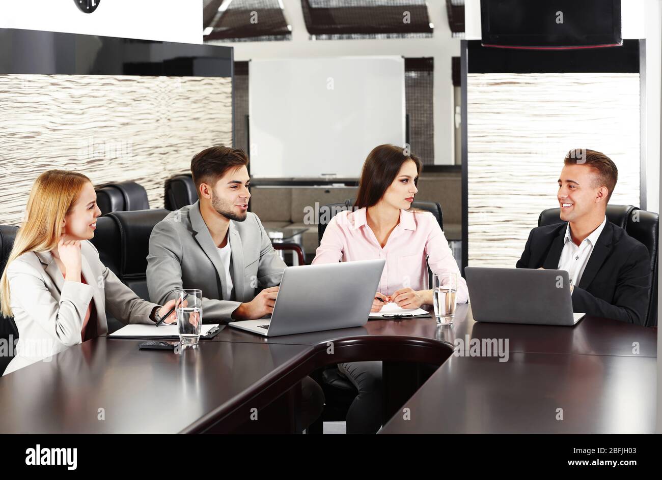 Business people working in conference room Stock Photo - Alamy