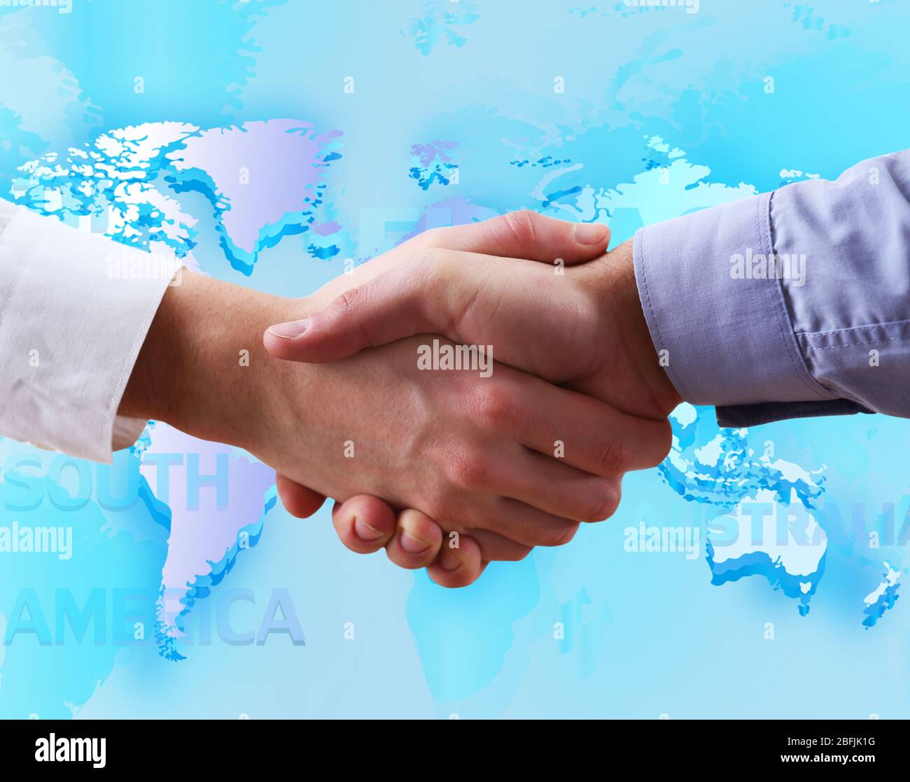 Business handshake on world map background Stock Photo - Alamy